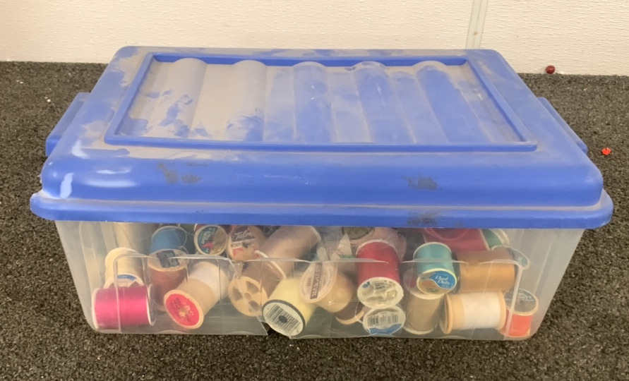 (1) PLASTIC STORAGE BIN FULL OF SEWING SUPPLIES INCLUDING THREAD ...