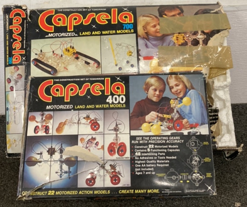 TWO VINTAGE CAPSELA 700 AND 400 GAMES (MISSING PIECES)