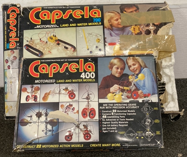 TWO VINTAGE CAPSELA 700 AND 400 GAMES (MISSING PIECES)