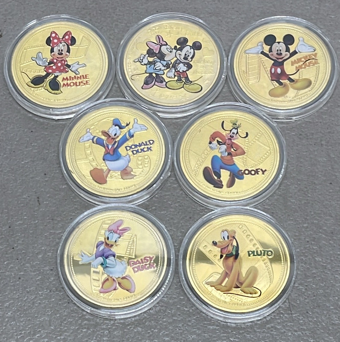 (7) Disney Character Gold Plated Collectible Coins