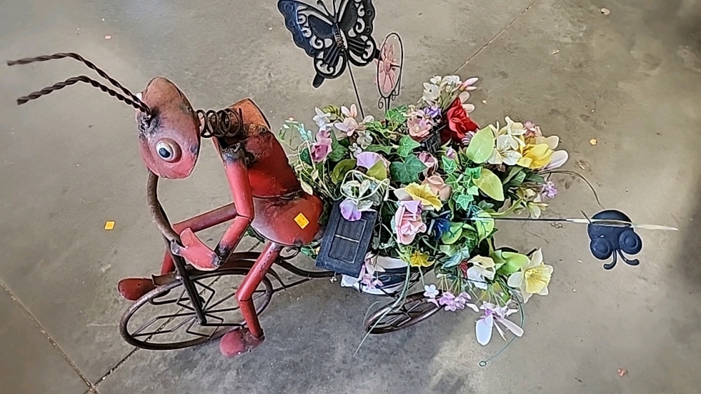 Ant Riding A Flower Bike Metal Statue