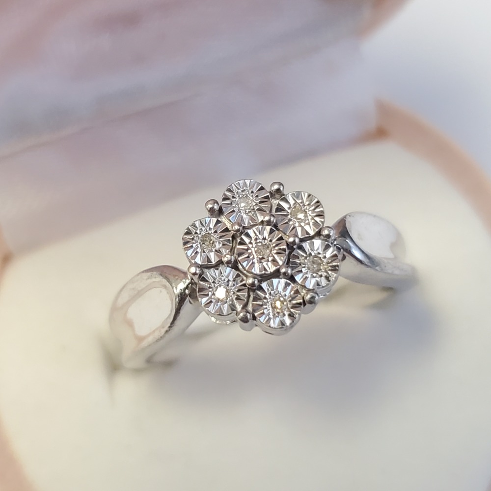 $200 Silver 7 Diamond Ring