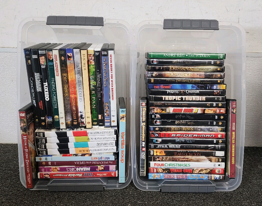 (40 ) DVDs In Plastic Locking Totes
