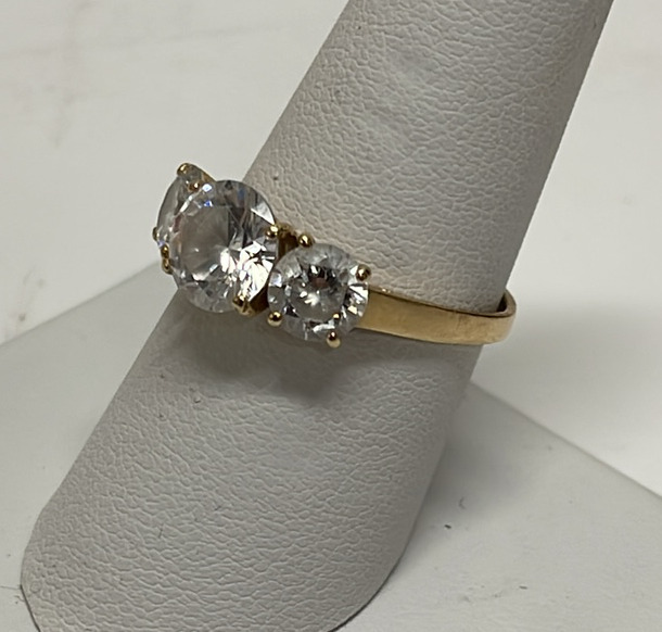 Gold Three-Stone Ring with Round Cut Stones