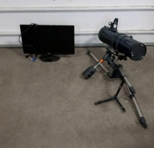 (1) Celestron AstroMaster 130 Telescope and (1) Acer Computer Monitor