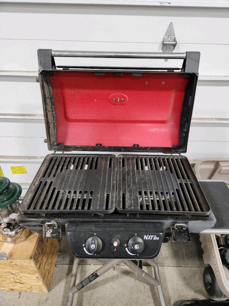 (1) Coleman Portable Grill (1) Coleman Lantern & Small Propane Tanks
